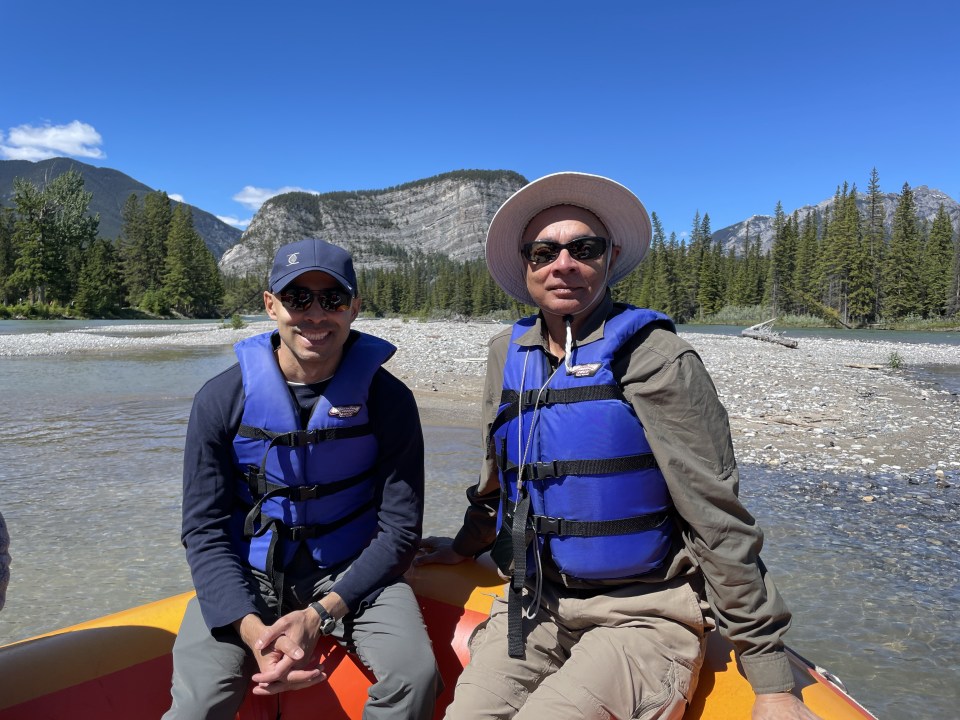 My son and I rafting on the Bow River, Banff. | Ranjan's Writings